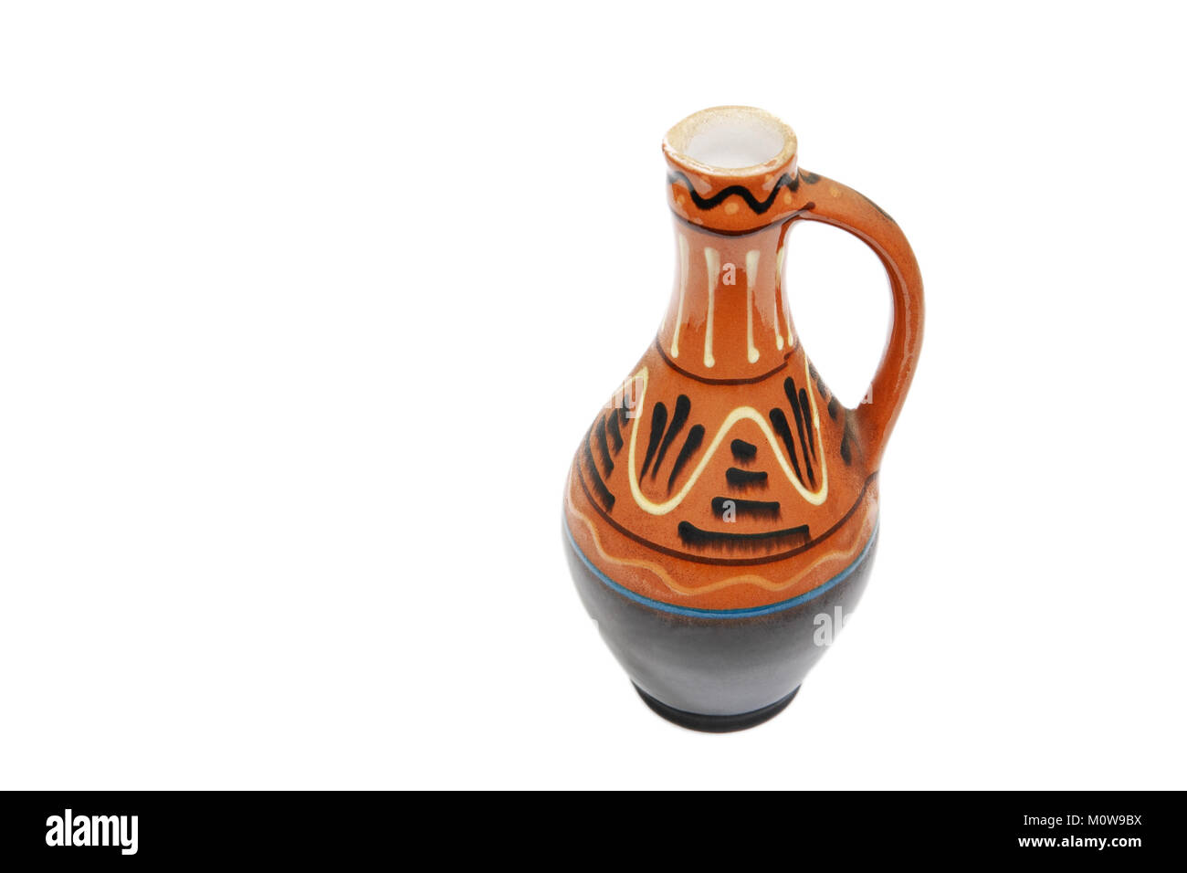 Ceramic painted, traditional jug on white background Stock Photo - Alamy