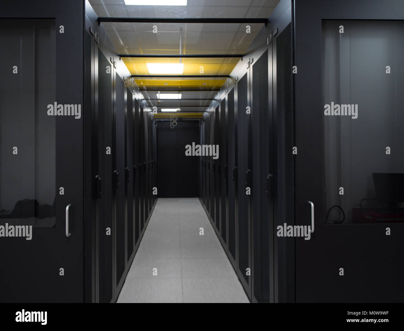 modern server room with black servers and hardwares in a internet data ...