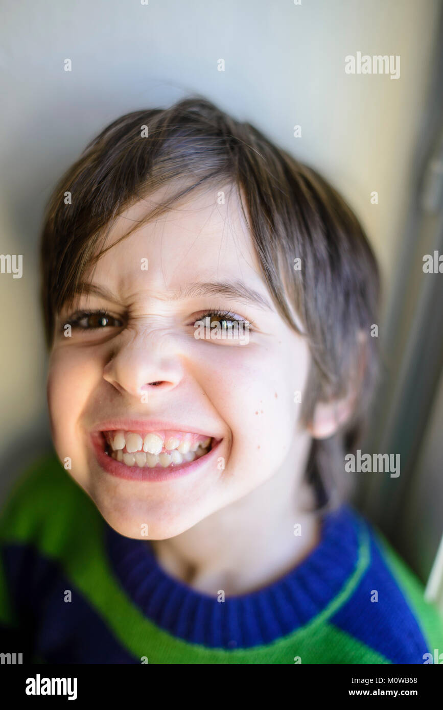 child makes grimaces Stock Photo - Alamy