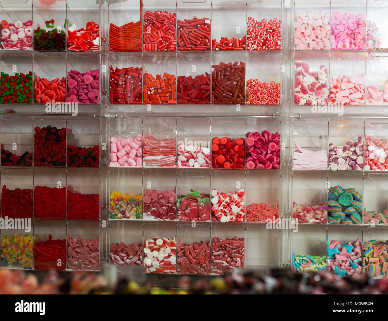 Sweets of different shapes and sizes selling in the store by weight ...
