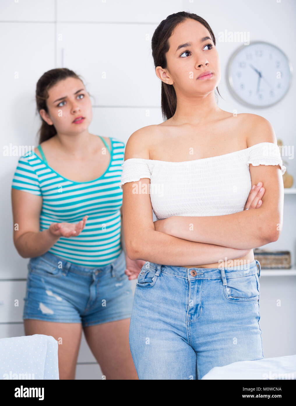 Adolescent girls finding out relationship at home Stock Photo - Alamy