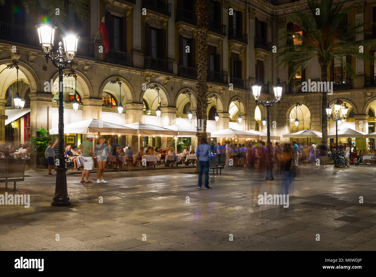 Famous Placa Reial (Royal Square) illuminated at night in Barcelona ...