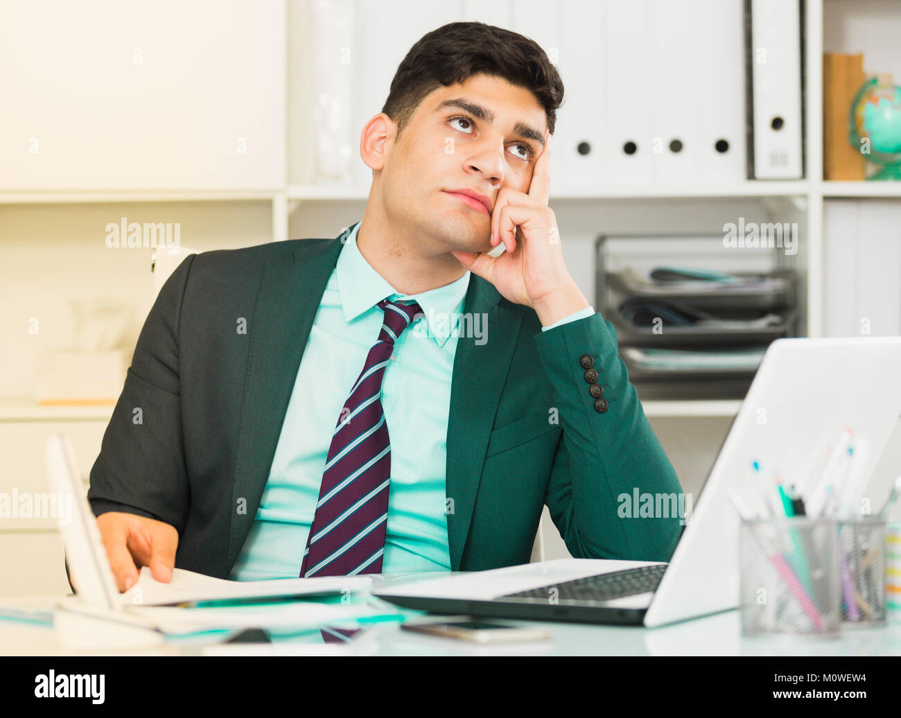 Businessman having complicated issue hi-res stock photography and ...