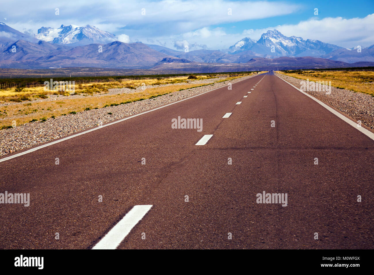 Highway leading to mountains of Andes, near Las Lenas. Argentina, South ...