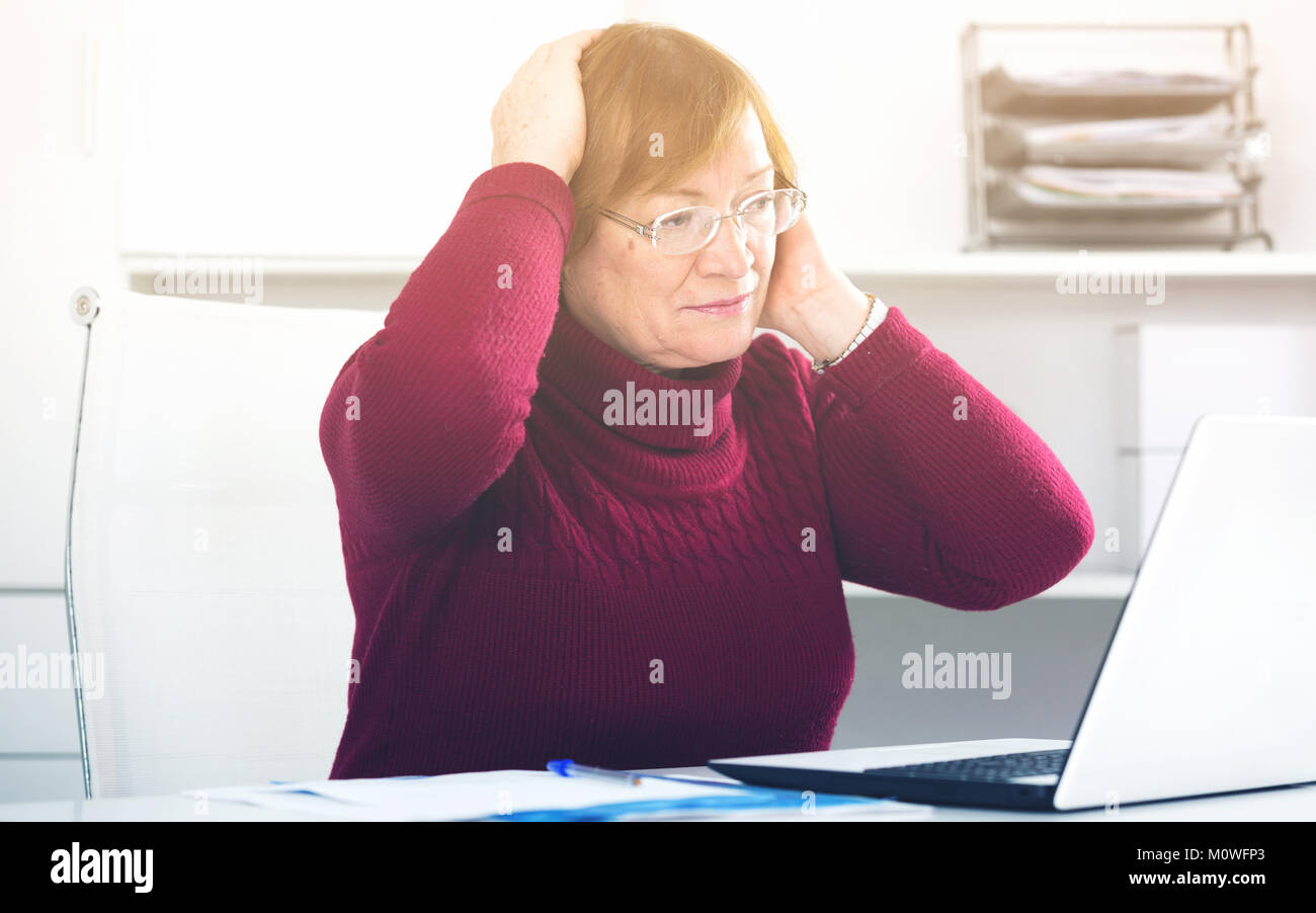 Female employee having complicated issue in project in office Stock ...