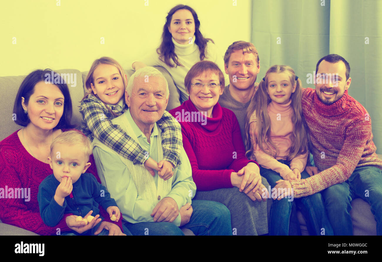 Family members making family photo during a reunion party Stock Photo ...