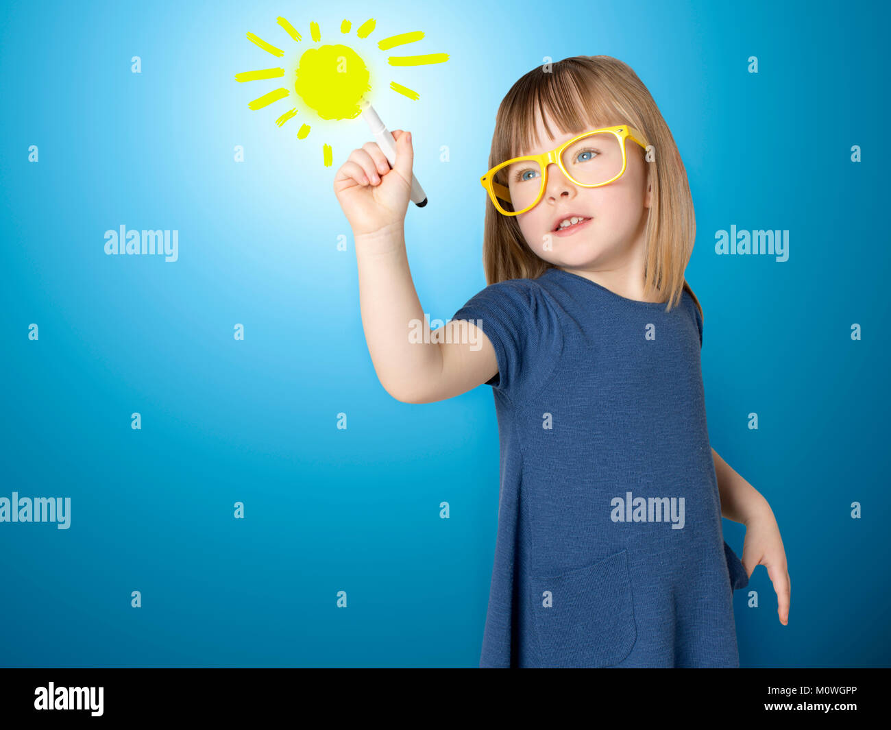 Little girl drawing on glass. Isolated on white Stock Photo - Alamy