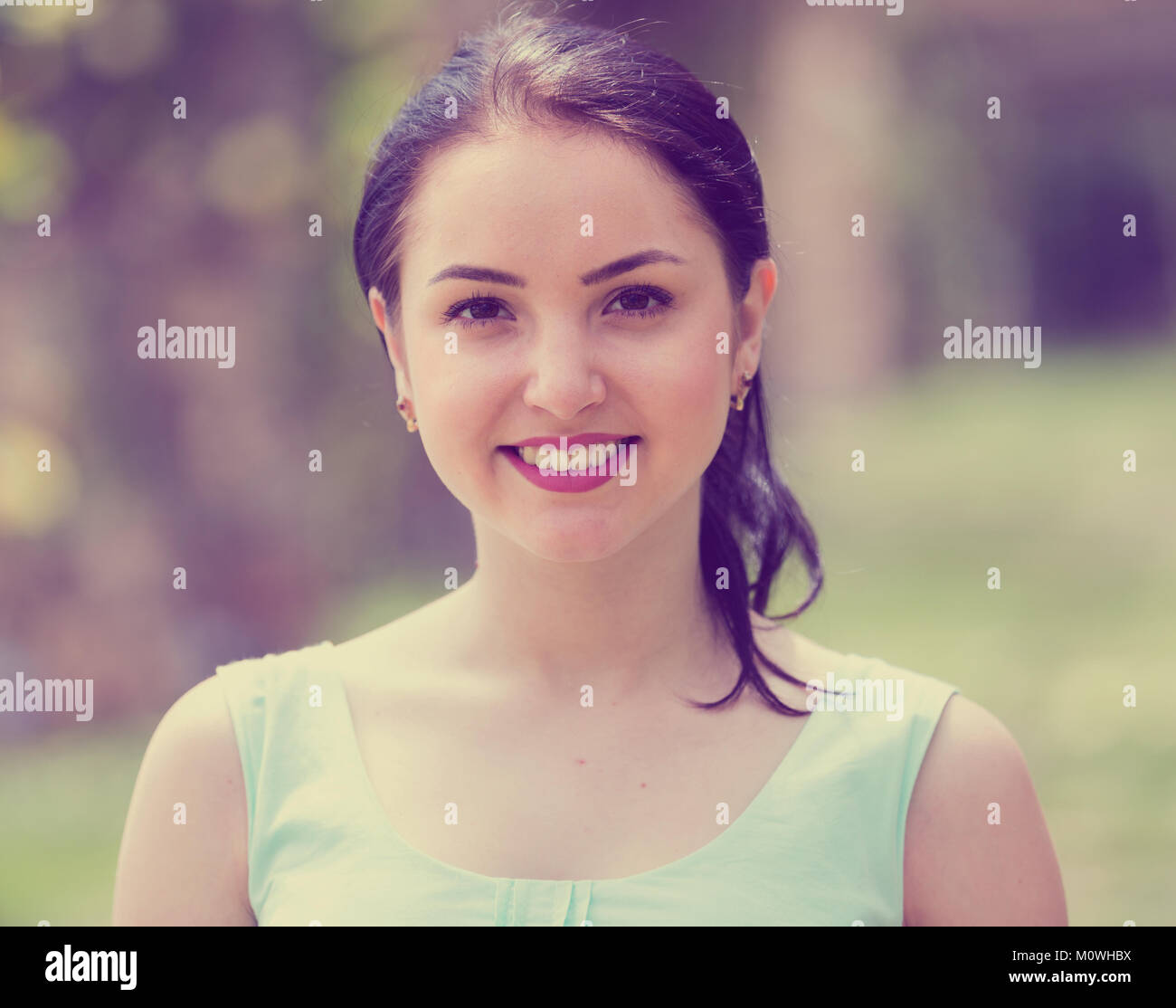 sunny cheerful smiling young russian woman portrait in outdoors Stock ...