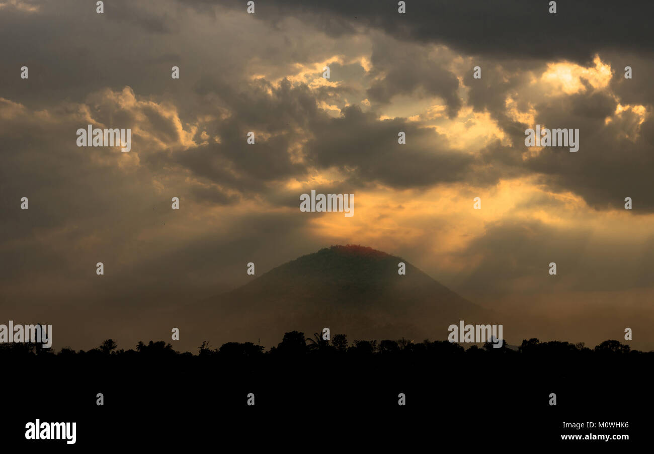 Fantastic landscape with mountain and rays of light shine,Dramatic ...