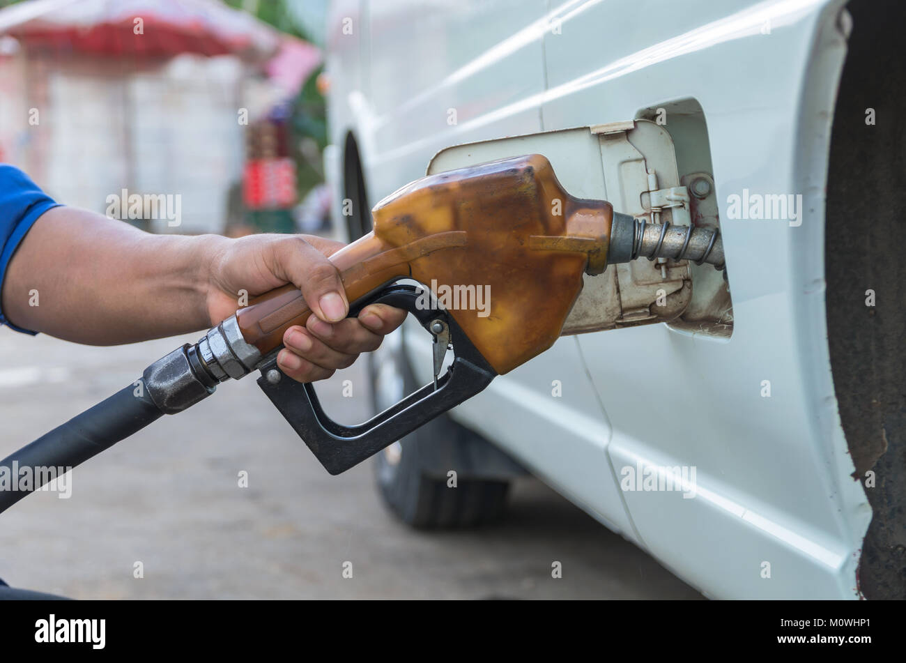 Filling motorcycle tank gas station hi-res stock photography and images ...