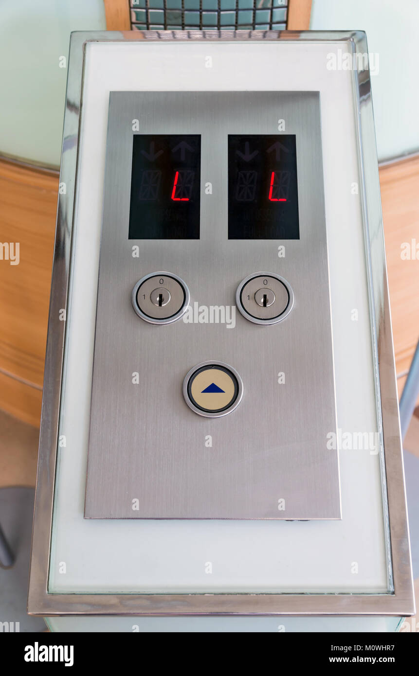 Elevator Button up direction with L for lobby floor Stock Photo - Alamy