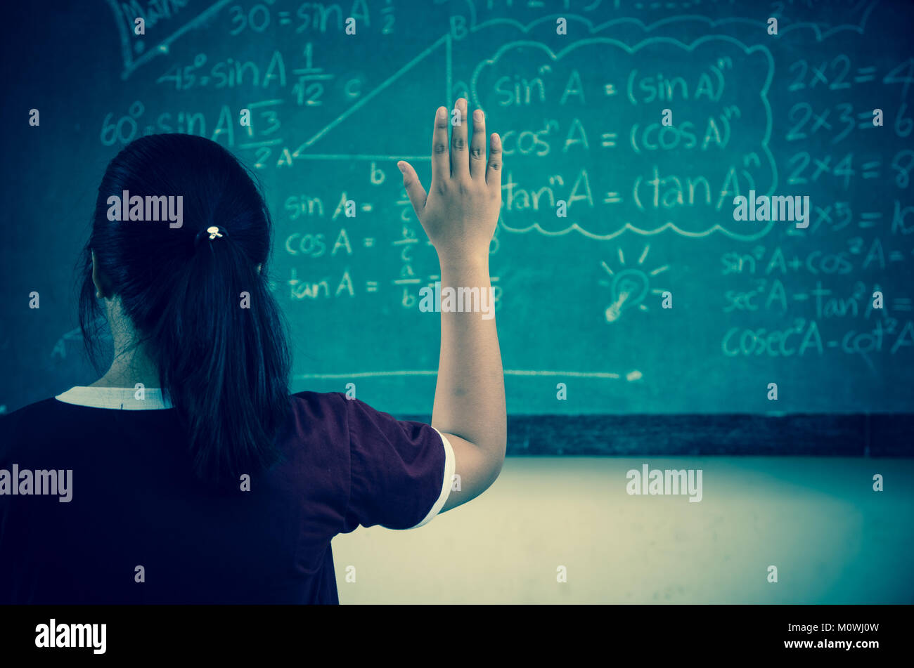 Children hands raised classroom hi-res stock photography and images - Alamy