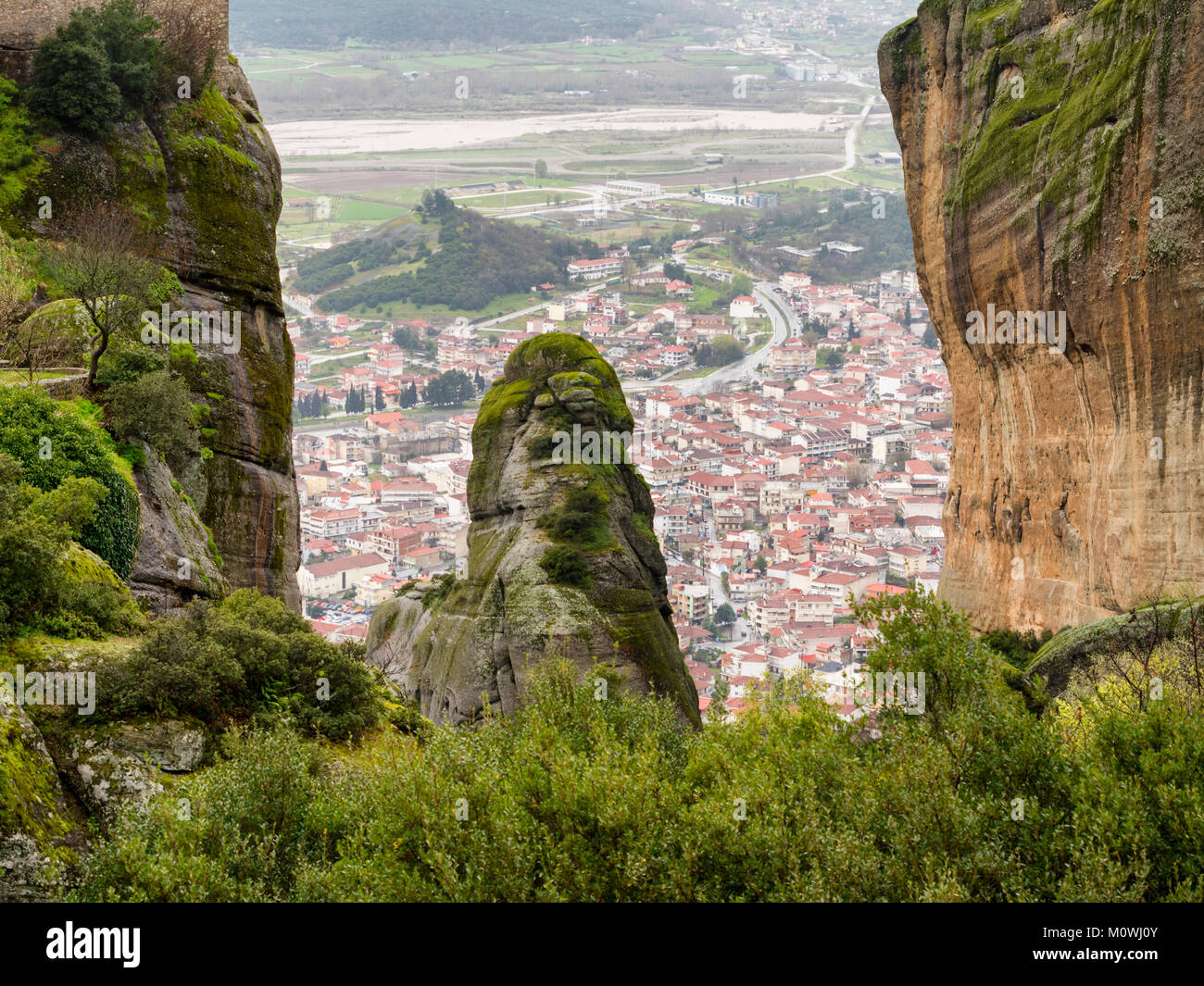the view of kalabaka town underthe rocks of meteora mountain in north ...