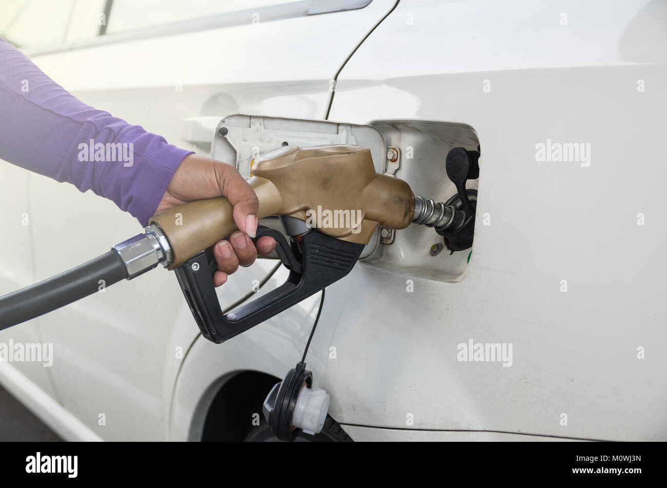 Filling motorcycle tank gas station hi-res stock photography and images ...