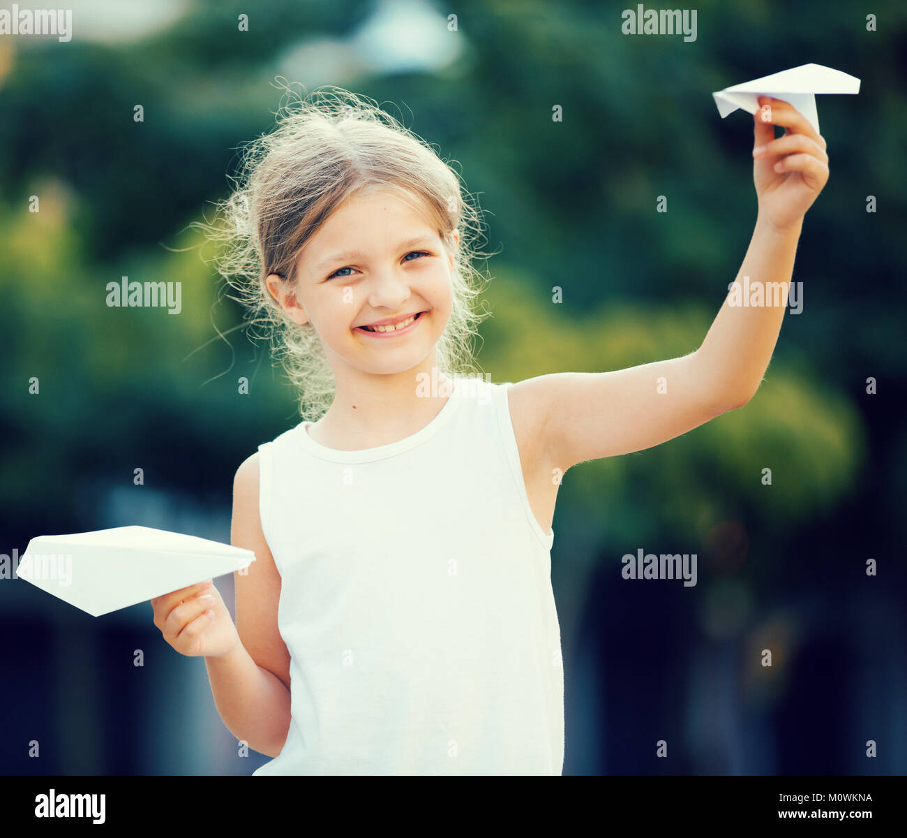 Holding paper airplanes hi-res stock photography and images - Alamy