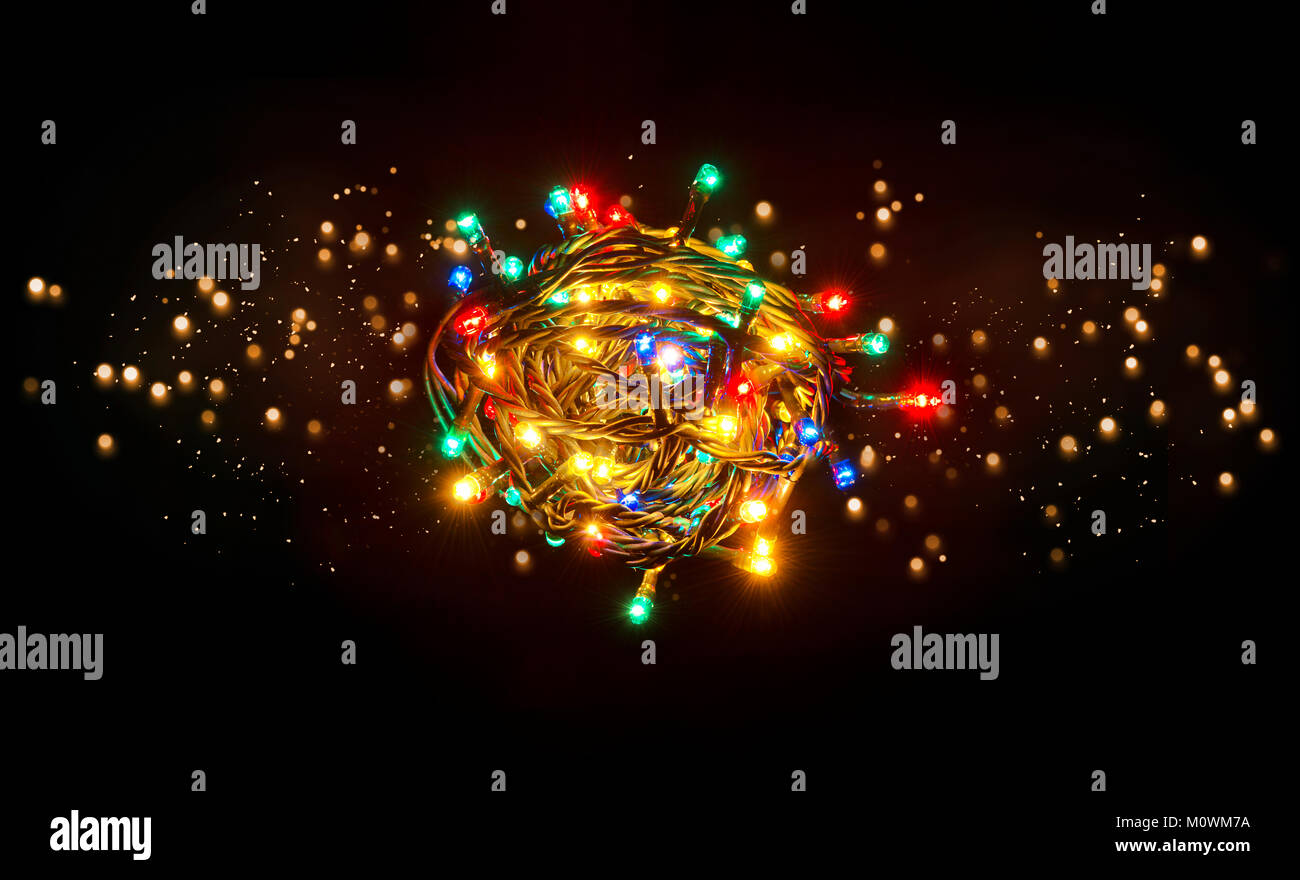 Shiny christmas led lights on black background Stock Photo - Alamy