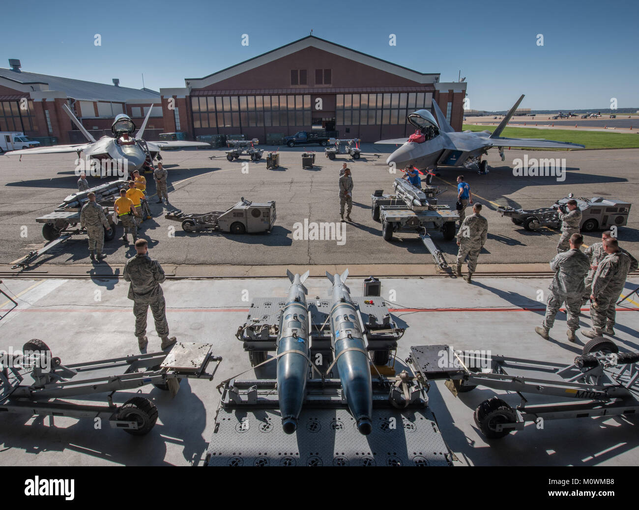 U.S. Air Force weapons load crew Airmen from the 94th and 27th Aircraft ...