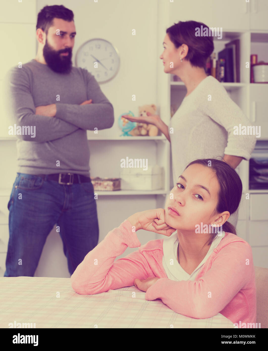 Father and mother having disagreement while their child at home Stock ...