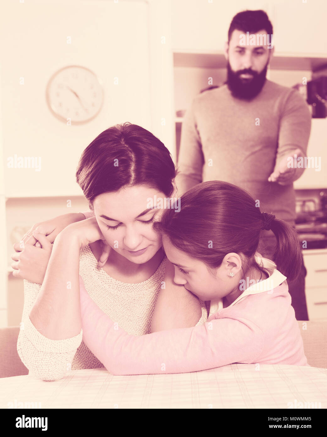 Father telling off his wife and daughter for disobedience at home Stock ...