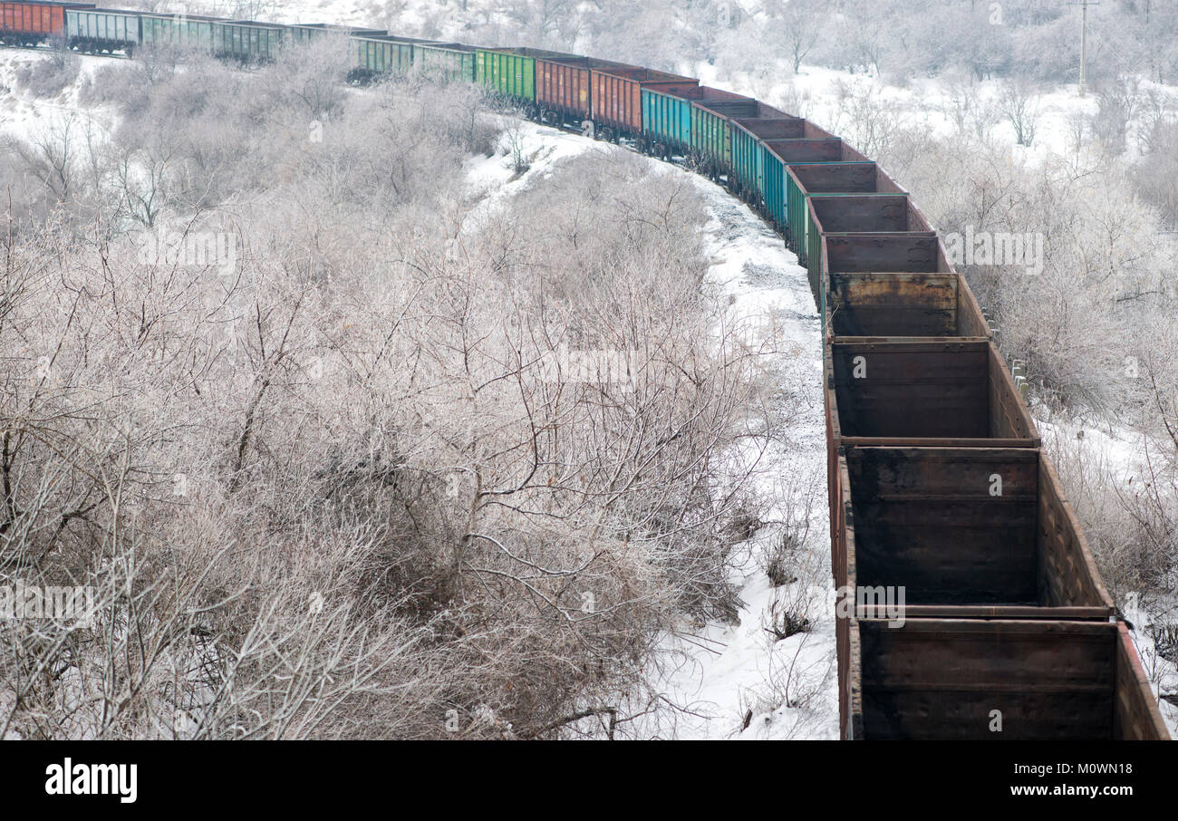 Top view of freight train with carriages on railways at winter Stock ...
