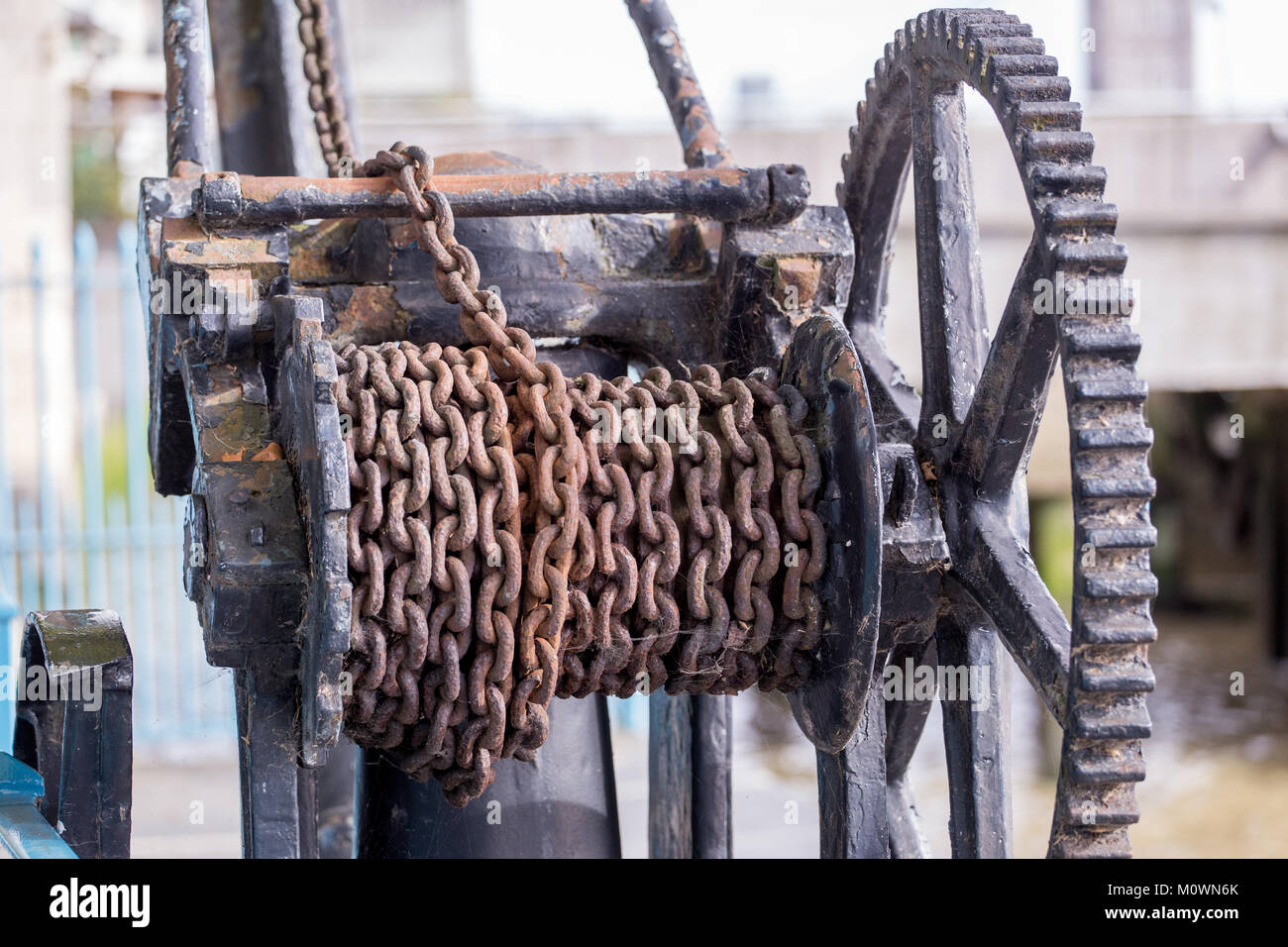 An old industrial winch on the River Thames, London Stock Photo - Alamy