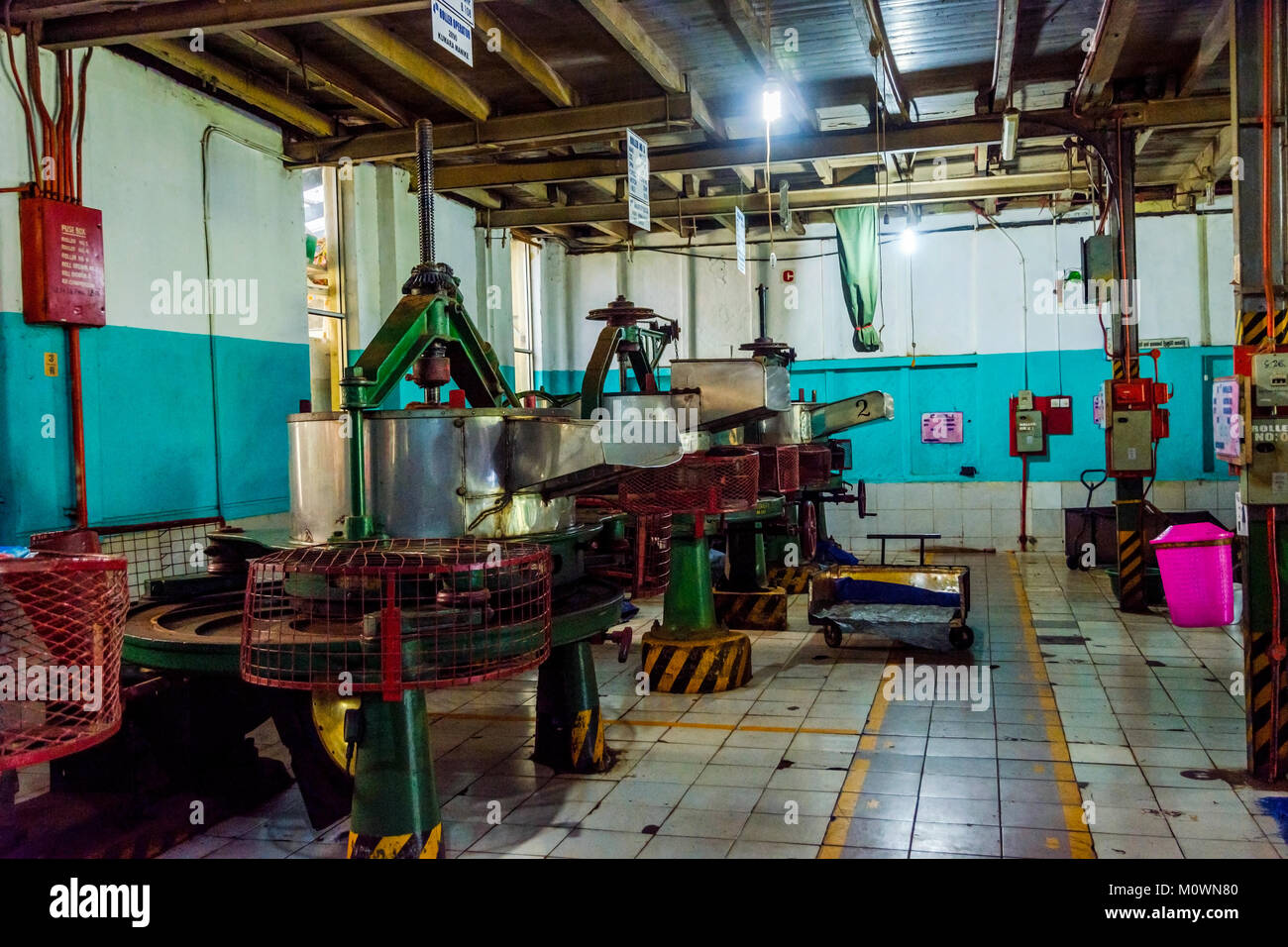 KANDY, SRI LANKA - FEBRUARY 8: Tea leafs rolling machines in a tea ...