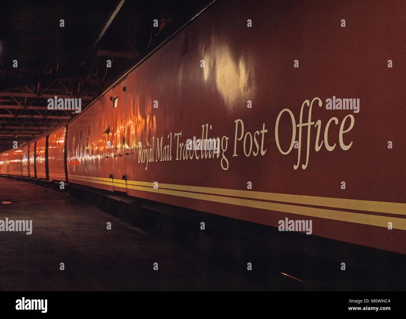 The Travelling Post Office Mail train at night Stock Photo - Alamy