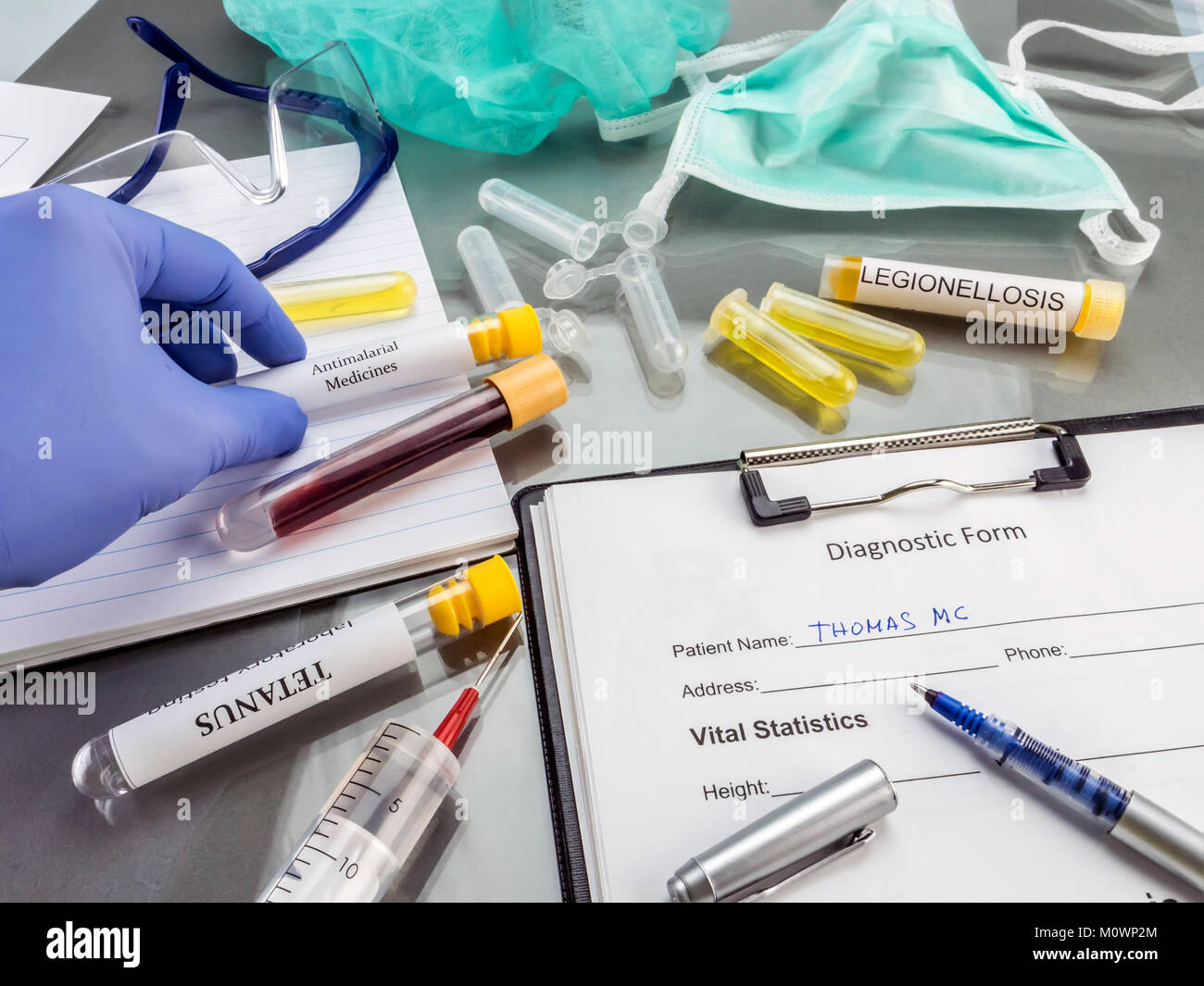 Doctor working with samples of contagious diseases in a clinical ...