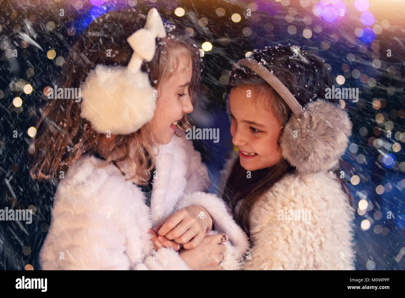 snow girls have fun outside Stock Photo - Alamy