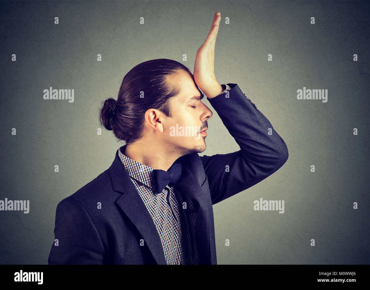 Slapping forehead hi-res stock photography and images - Alamy