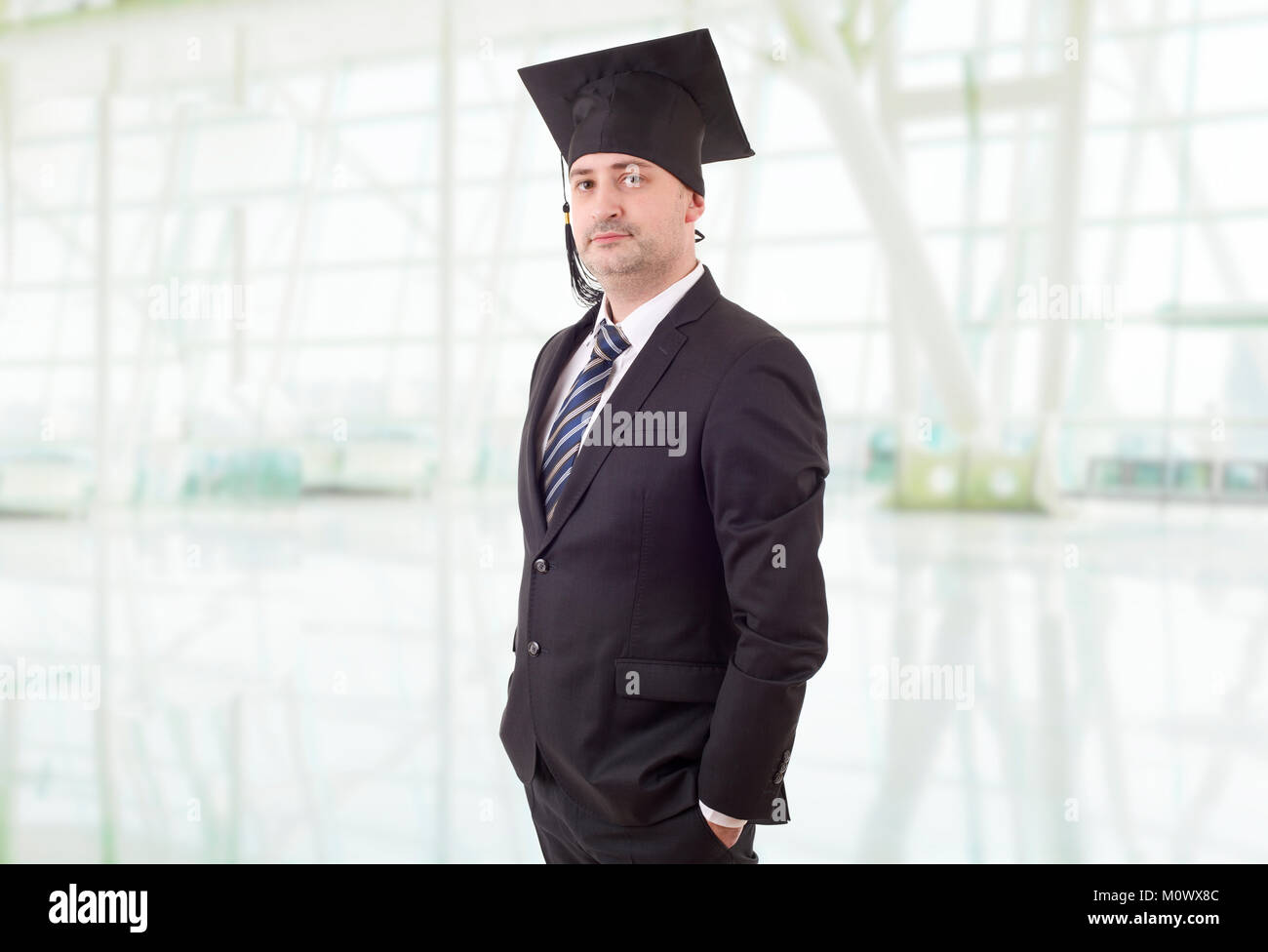 Proud male college professor standing at school Stock Photo - Alamy