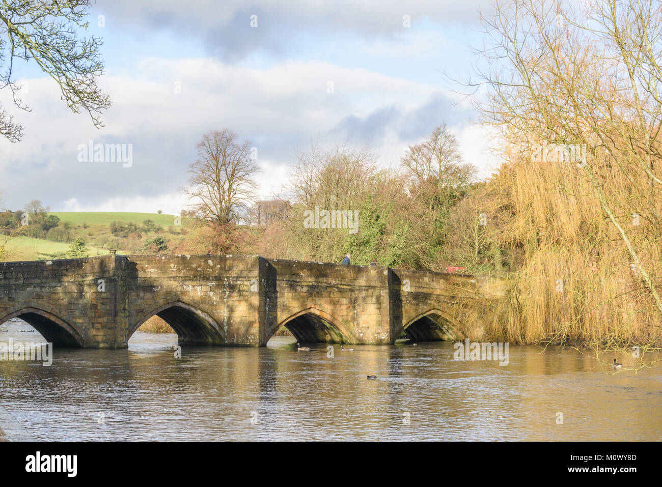 Stone bridge over the river Wye on a cold and sunny winter's day at the ...