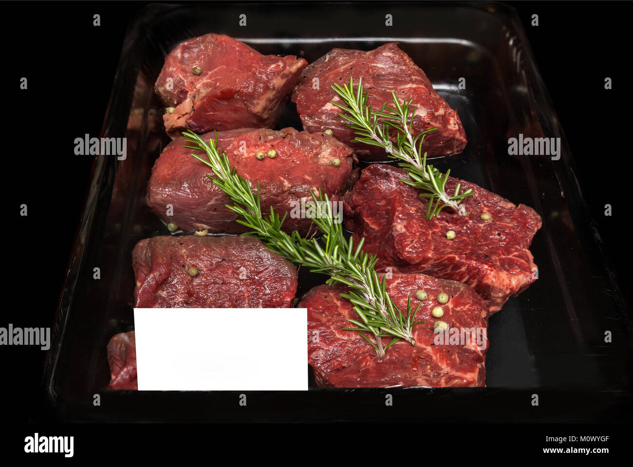 Raw beef on the baking sheet Stock Photo - Alamy