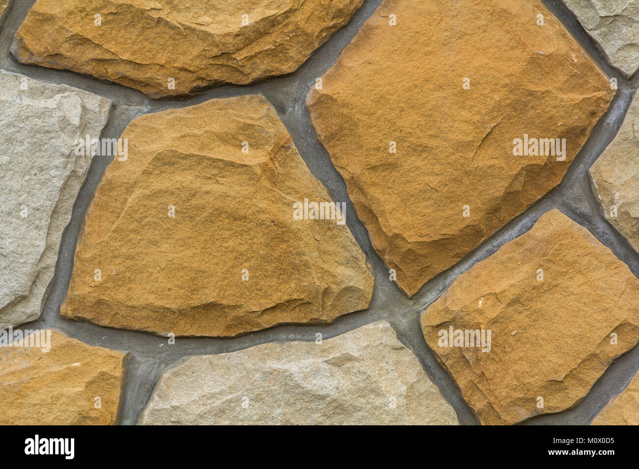 Different sizes of sand stones. Stone wall pattern background Stock ...