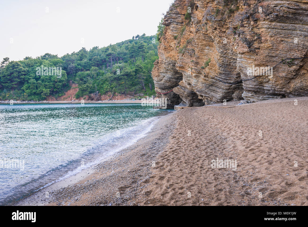 Mogren beach in Budva city on the Adriatic Sea coast in Montenegro ...