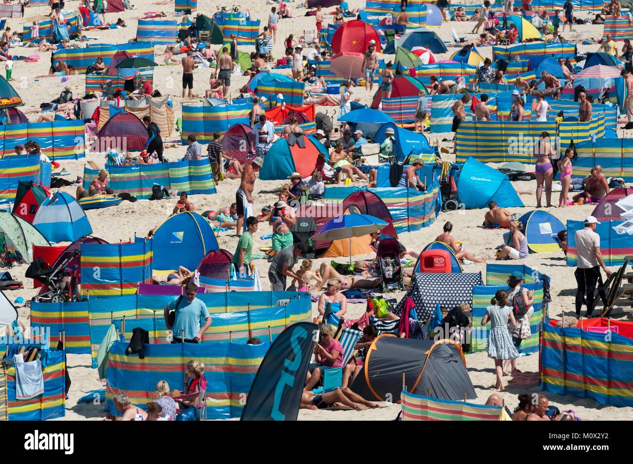 Group Sunbathing On Beach Cornwall High Resolution Stock Photography ...