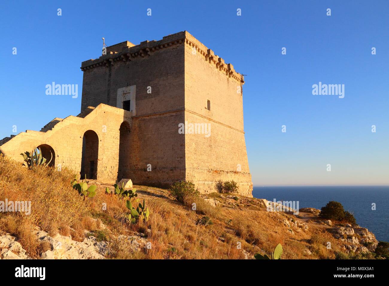 Apulia sunset view - Porto Selvaggio defensive tower landmark. Italy ...