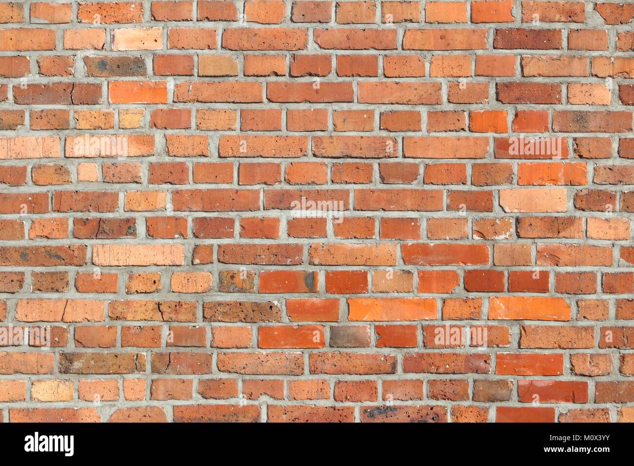 Red aged brick wall texture. Building background Stock Photo - Alamy