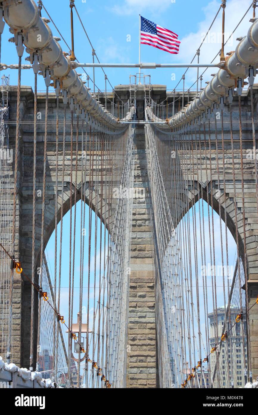 New York City, United States - famous Brooklyn Bridge with US flag ...