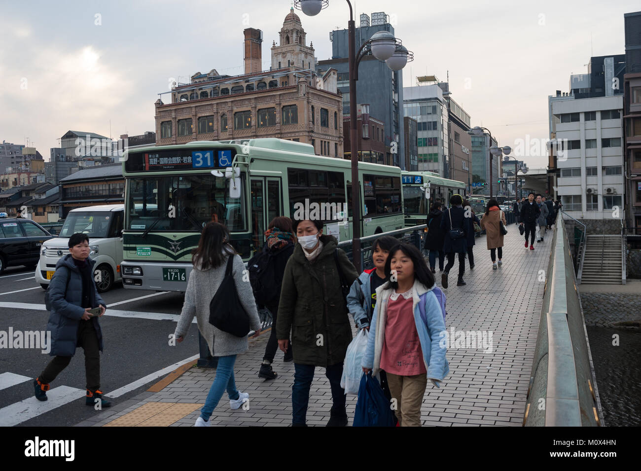 23.12.2017, Kyoto, Japan, Asia - Pedestrians are seen crossing the ...