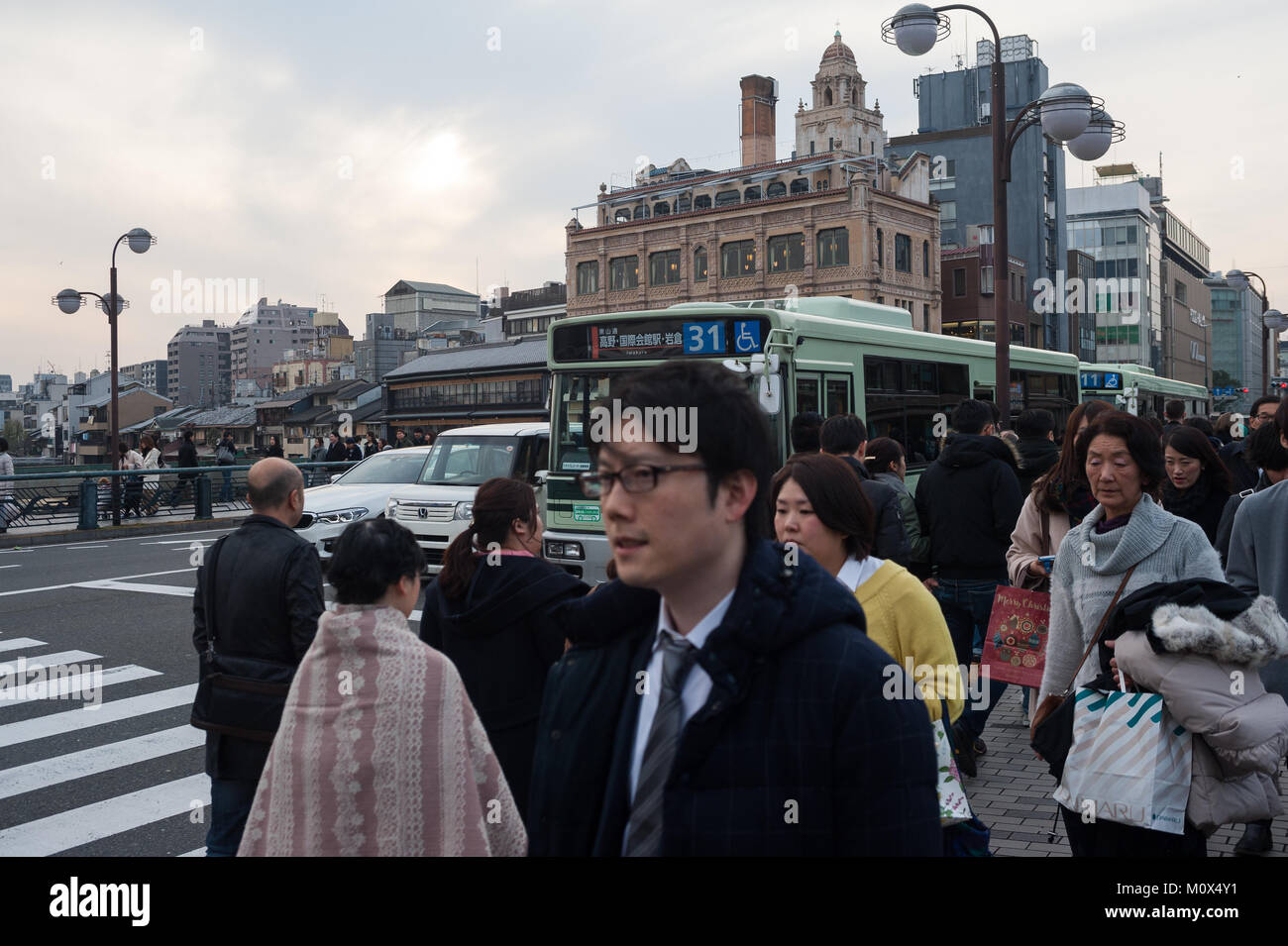 23.12.2017, Kyoto, Japan, Asia - Pedestrians are seen crossing the ...