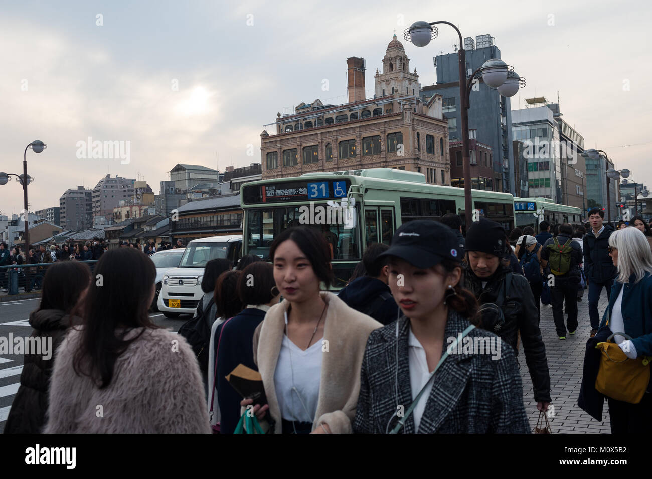 23.12.2017, Kyoto, Japan, Asia - Pedestrians are seen crossing the ...