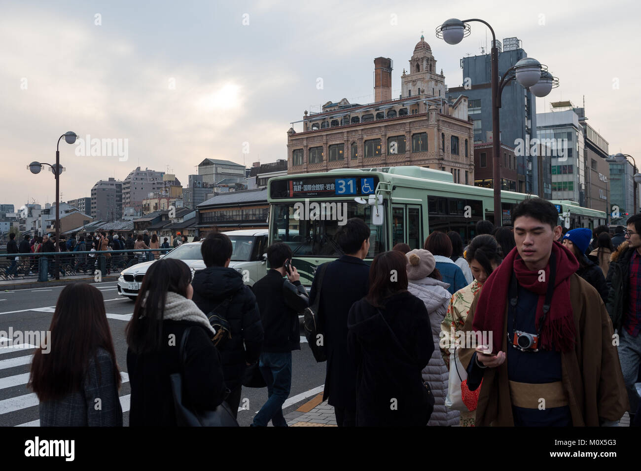 23.12.2017, Kyoto, Japan, Asia - Pedestrians are seen crossing the ...