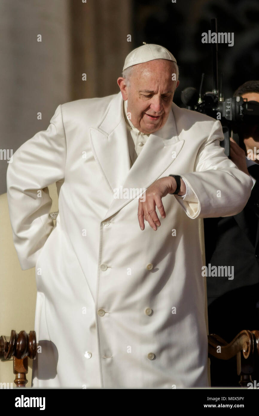 Vatican City, Vatican. 24th Jan, 2018. Pope Francis looks at his watch ...