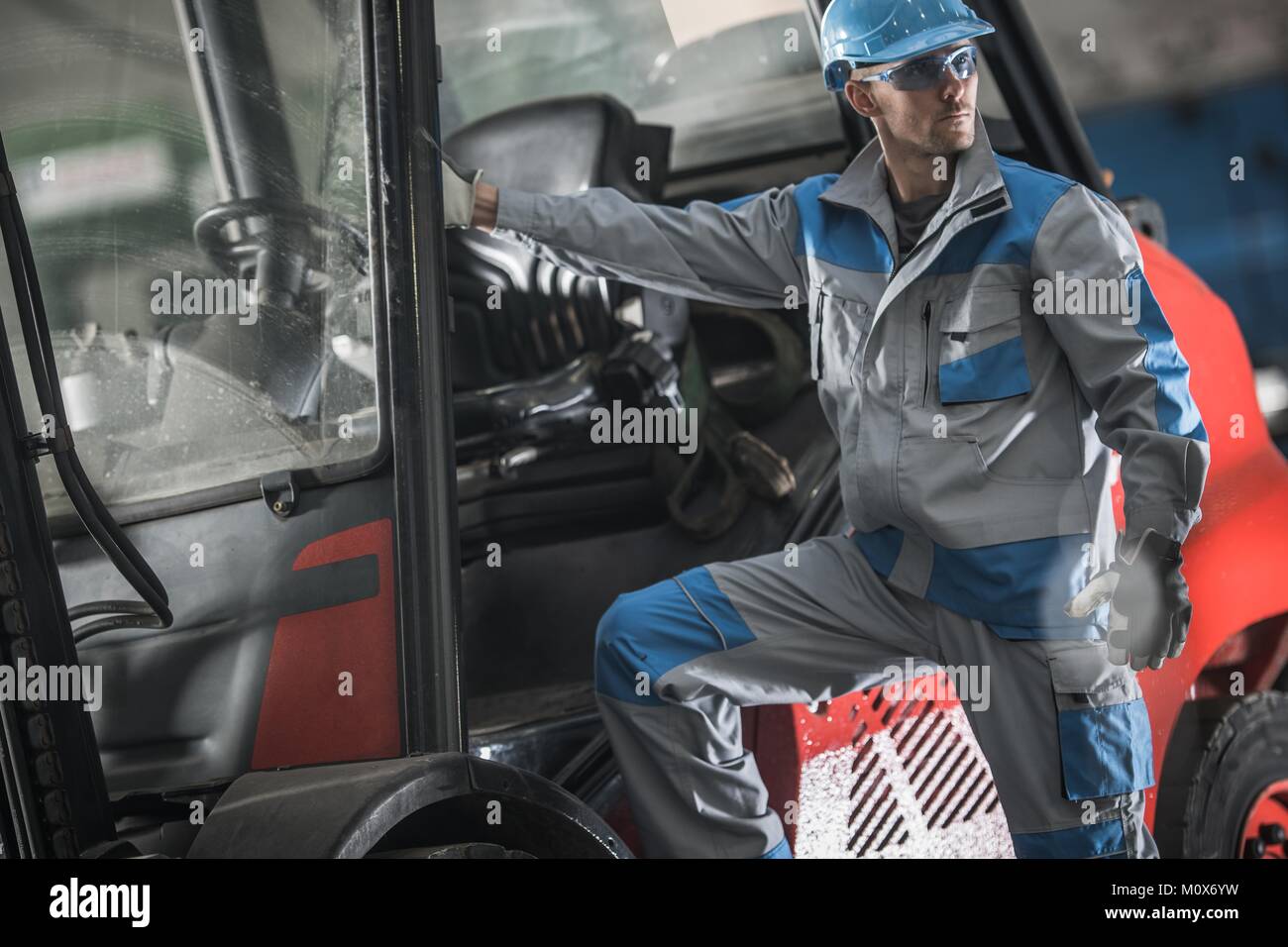 Lift Truck Operator Job. Caucasian Worker and His Forklift. Production ...