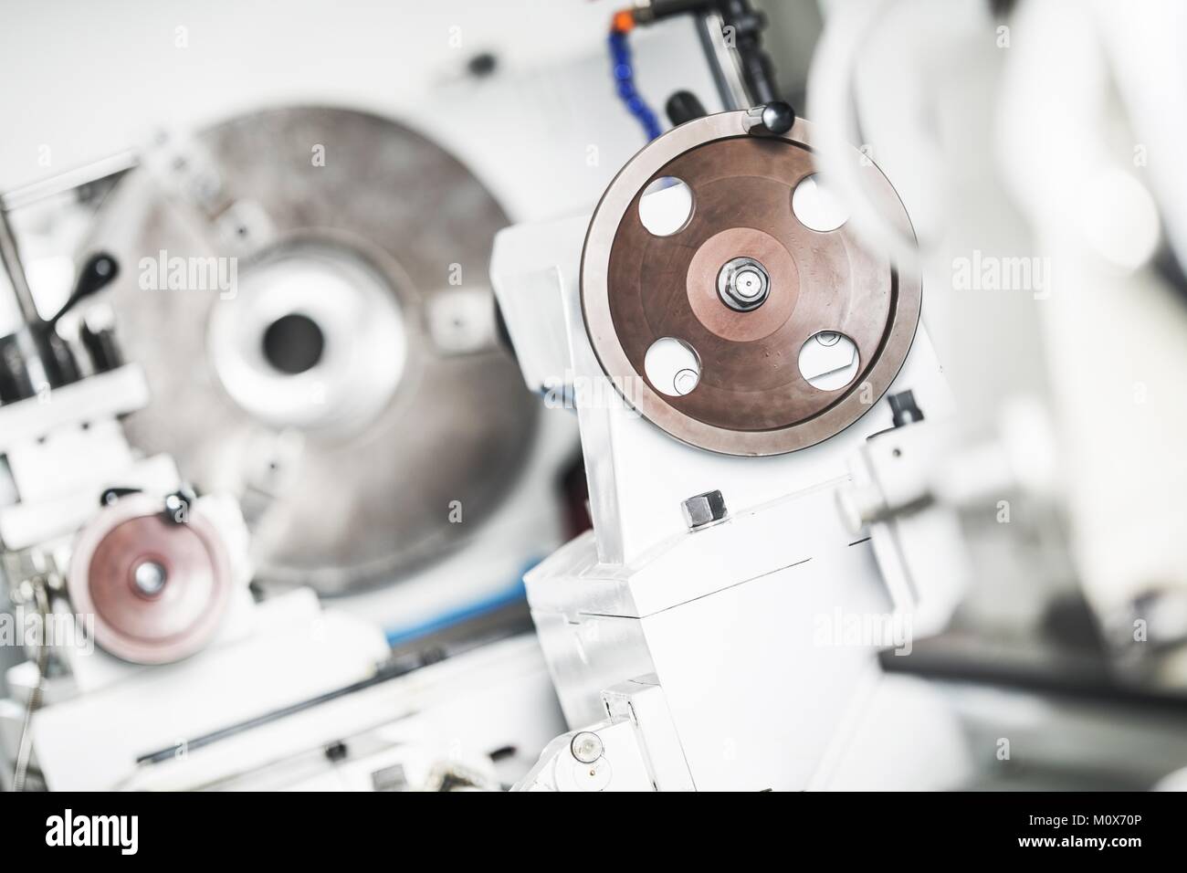 Modern Metal Lathe Machine Adjustment Wheel Closeup with Shallow Depth ...