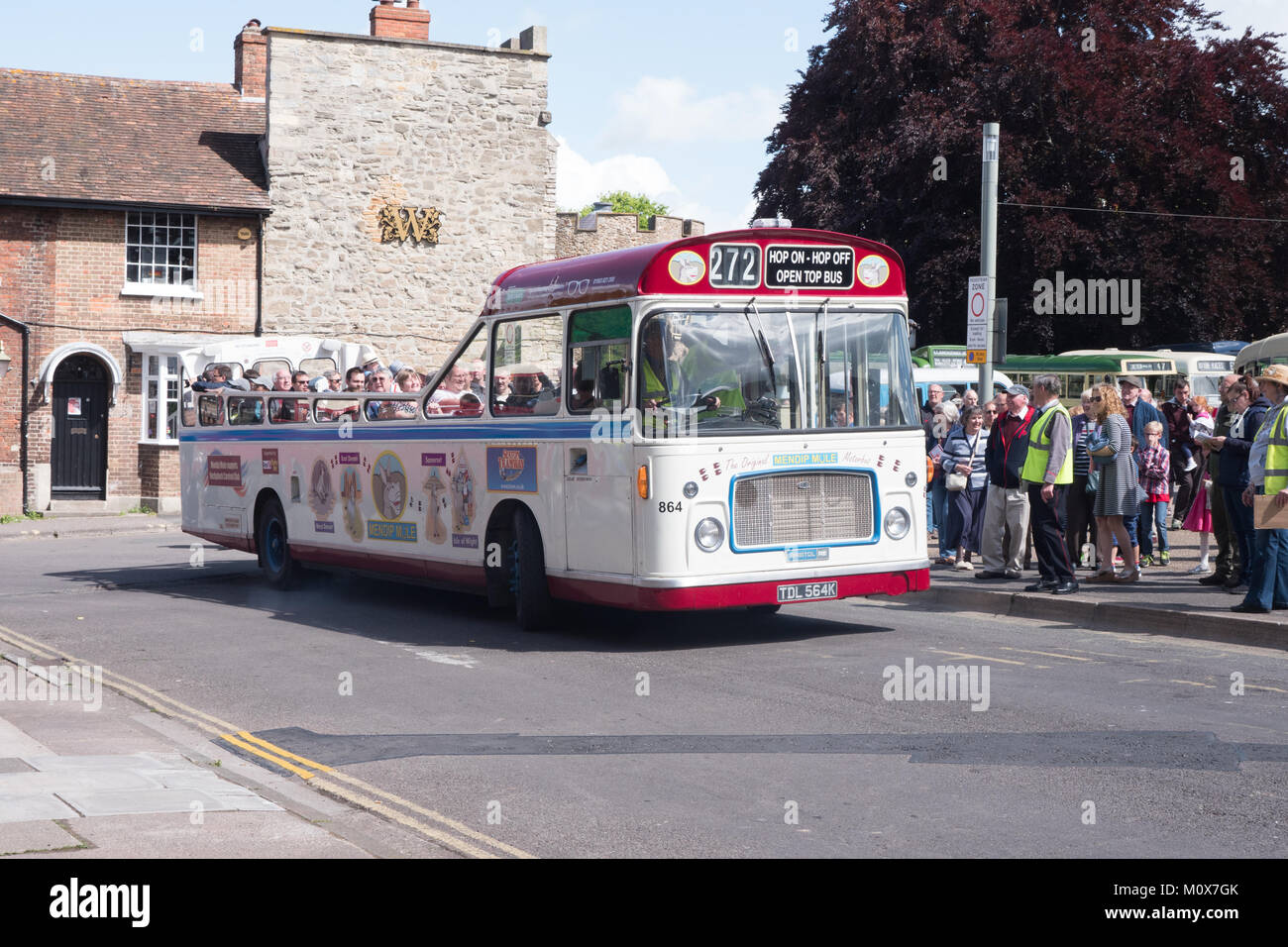 Passengers queuing for a vintage bus ride Stock Photo - Alamy