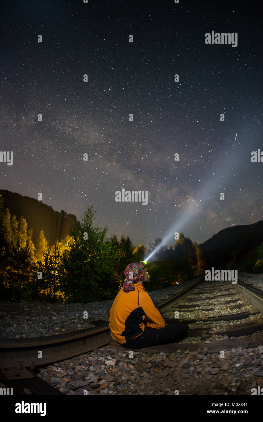 hiker at night, wearing a head torch Stock Photo - Alamy