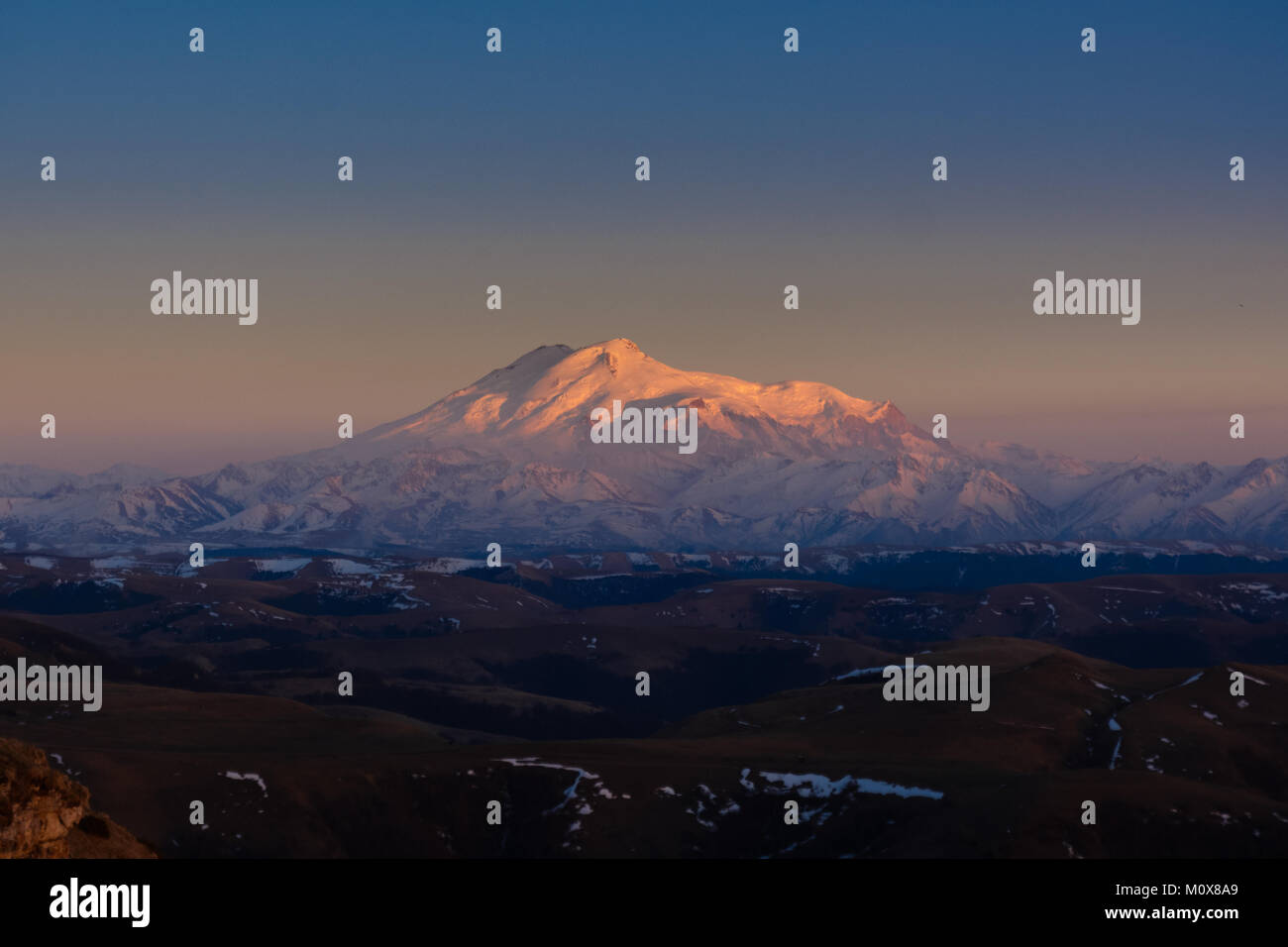 Elbrus at sunset. Mount Elbrus is the highest mountain in Europe, and ...