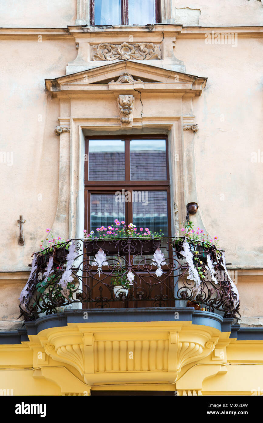 old balcony with flowers. balcony over the cracks and modeling Stock ...